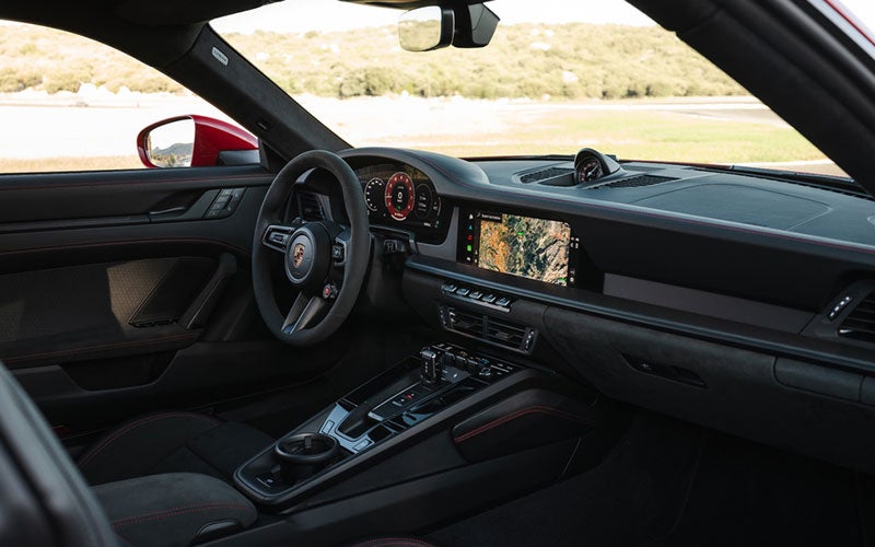 Porsche 911 Carrera GTS vs 4 GTS - 2025 Model Comparison with Specs